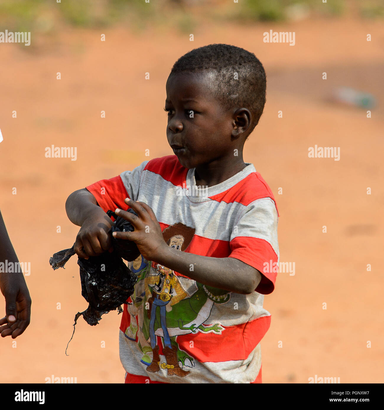 TECHIMAN, GHANA - JAN 15, 2017: Unidentified Ashanti little boy plays ...
