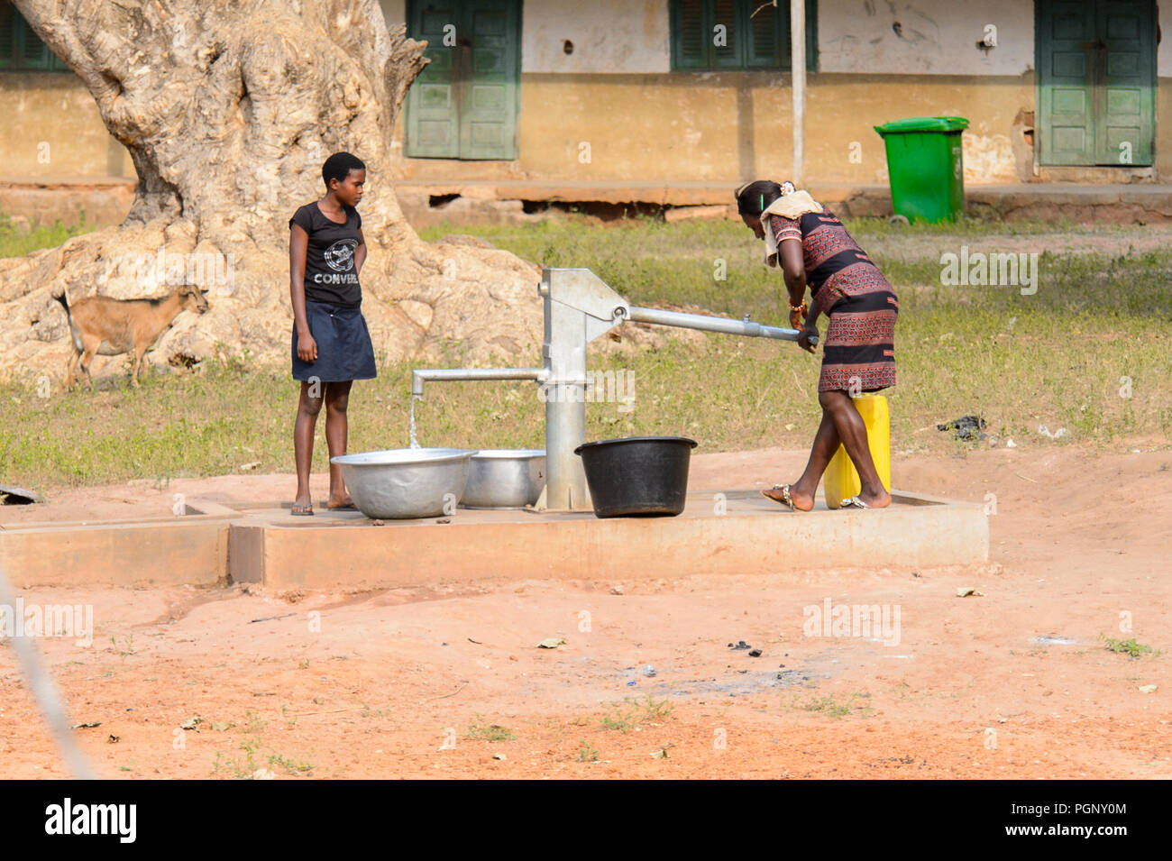 BOABENG, GHANA - JAN 15, 2017: Unidentified Ghanaian women pour the ...