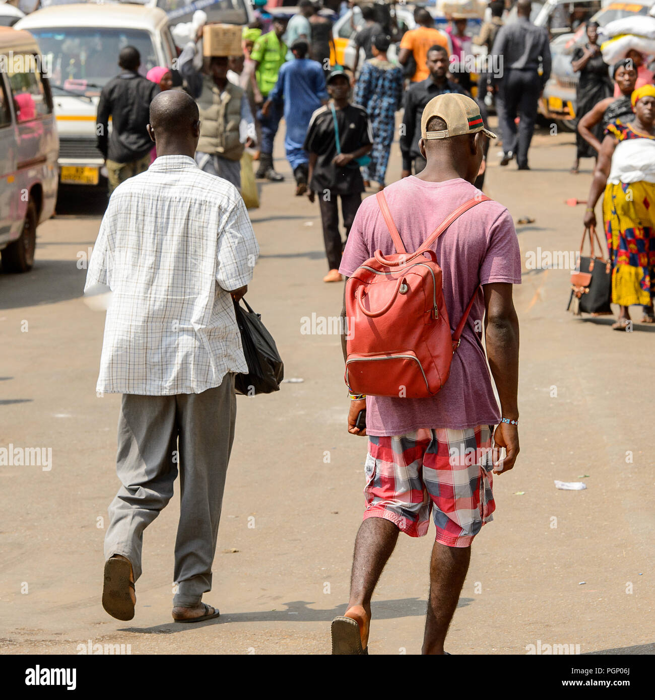 KUMASI, GHANA - JAN 15, 2017: Unidentified Ghanaian people walk from ...