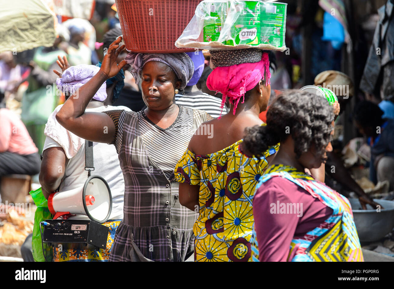 KUMASI, GHANA - JAN 15, 2017: Unidentified Ghanaian women walk at the ...