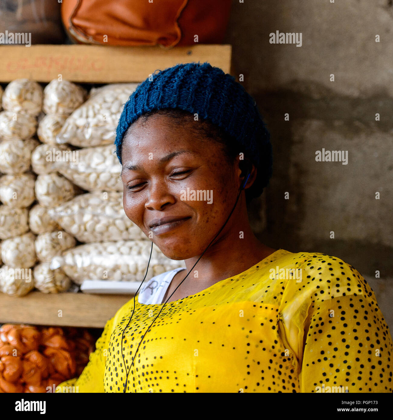 KUMASI, GHANA - JAN 15, 2017: Unidentified Ghanaian woman in yellow ...