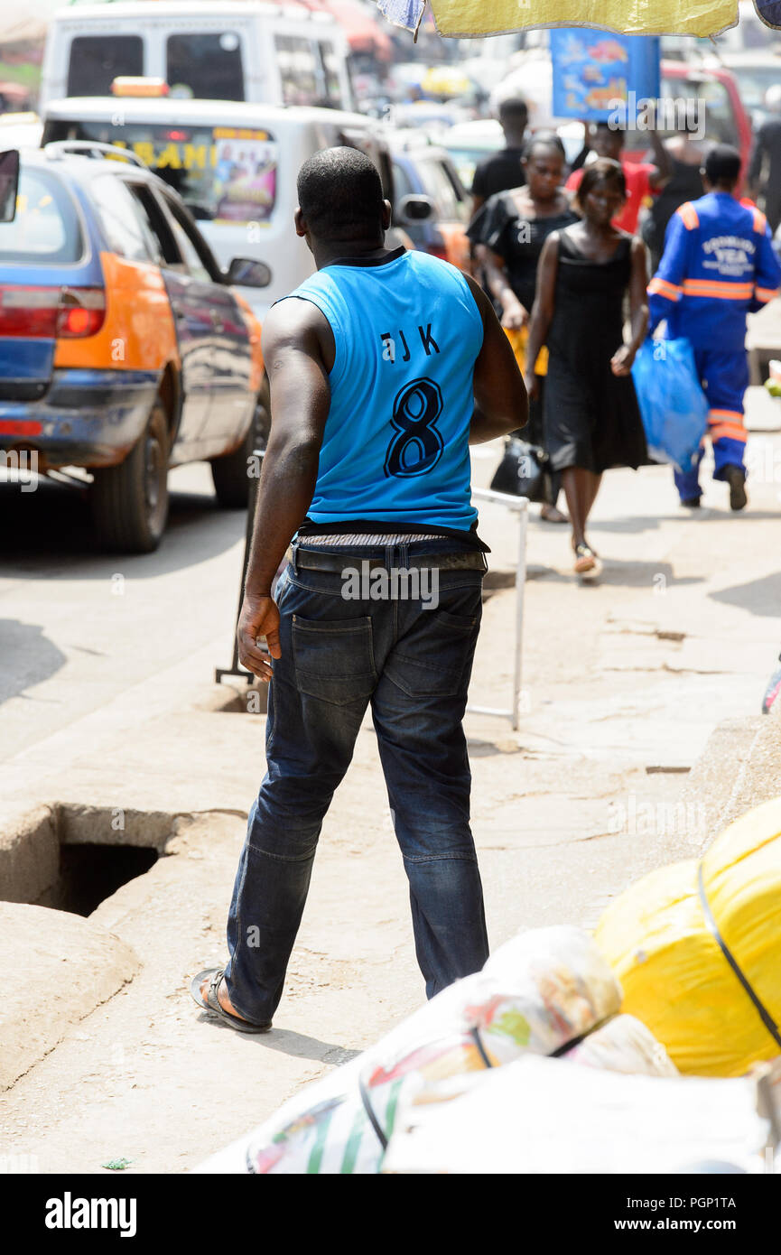 KUMASI, GHANA - JAN 15, 2017: Unidentified Ghanaian man in black shirt ...