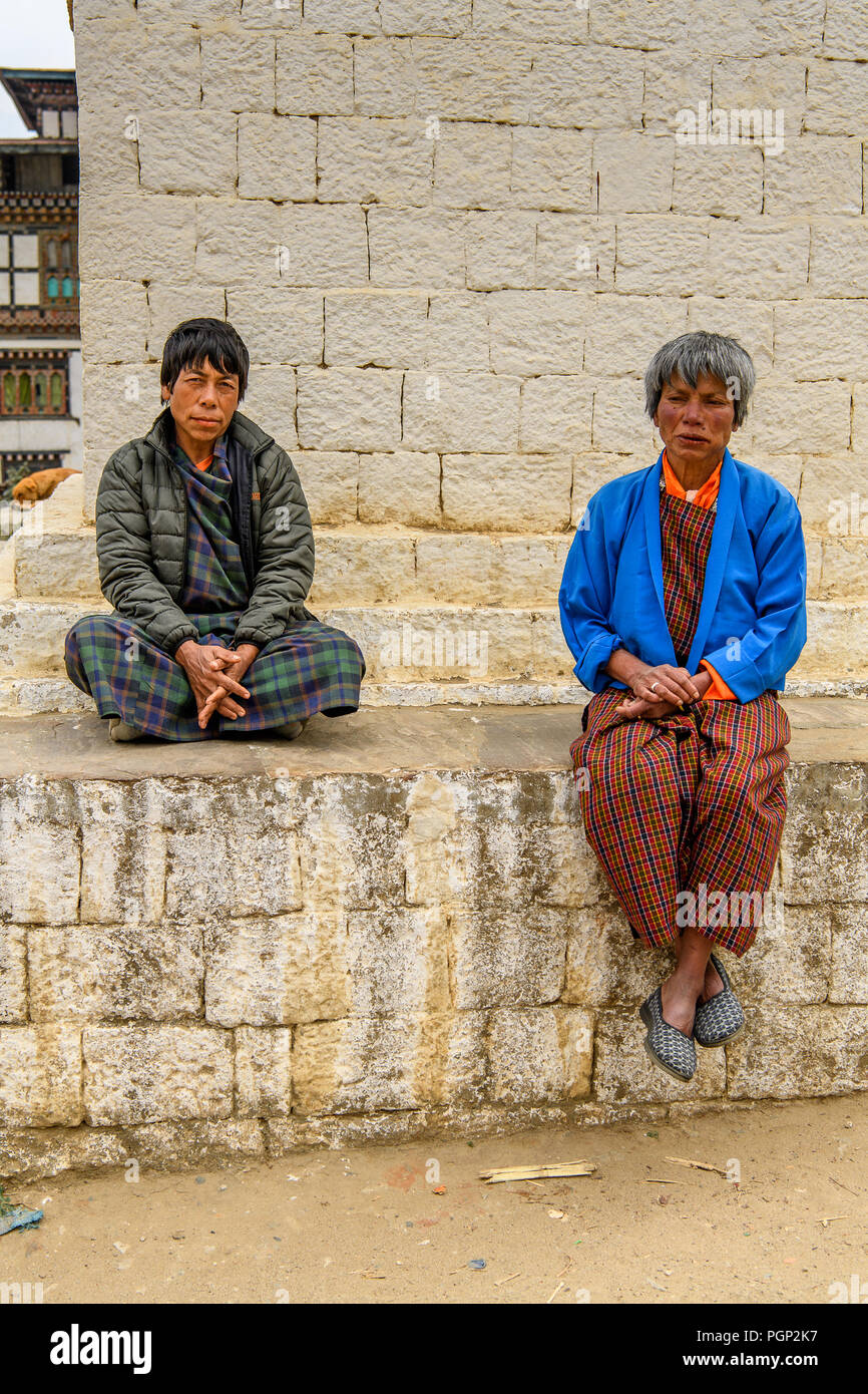TRIMPHU, BHUTAN - MAR 8, 2017: Unidentified Ngalops people sit on the ...