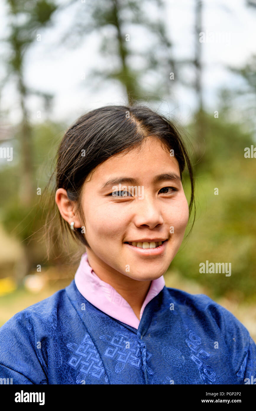 TRIMPHU, BHUTAN - MAR 8, 2017: Unidentified Ngalops young girl in blue ...