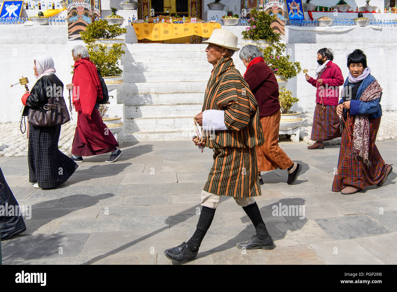 TRIMPHU, BHUTAN - MAR 8, 2017: Unidentified Ngalops people walk near ...