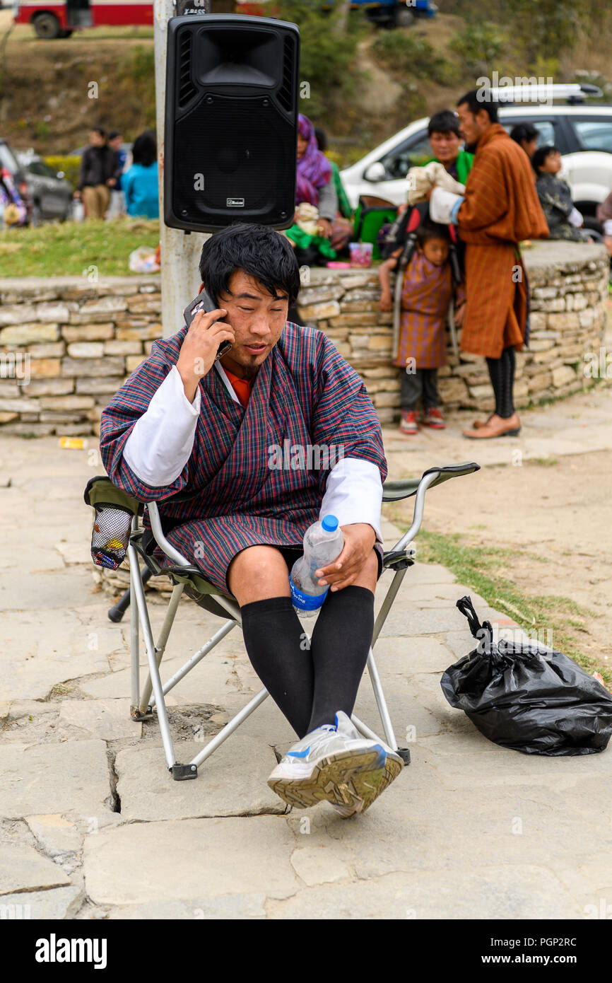 TRIMPHU, BHUTAN - MAR 8, 2017: Unidentified Ngalops man sits in a chair ...