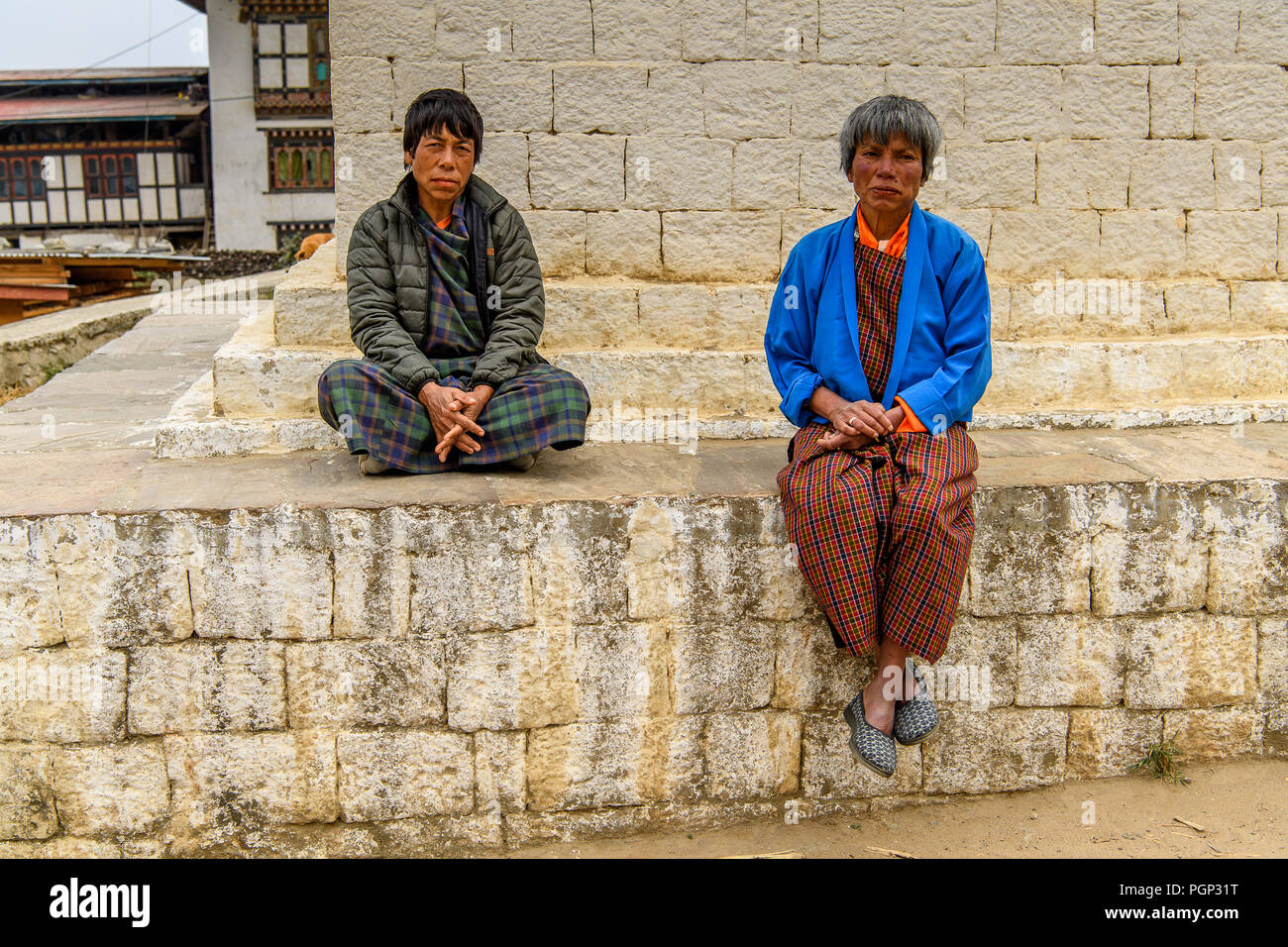 TRIMPHU, BHUTAN - MAR 8, 2017: Unidentified Ngalops people sit on the ...
