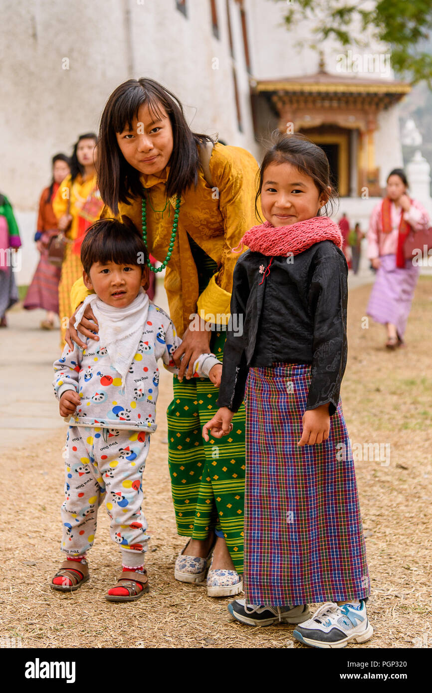 TRIMPHU, BHUTAN - MAR 8, 2017: Unidentified Ngalops woman and two ...