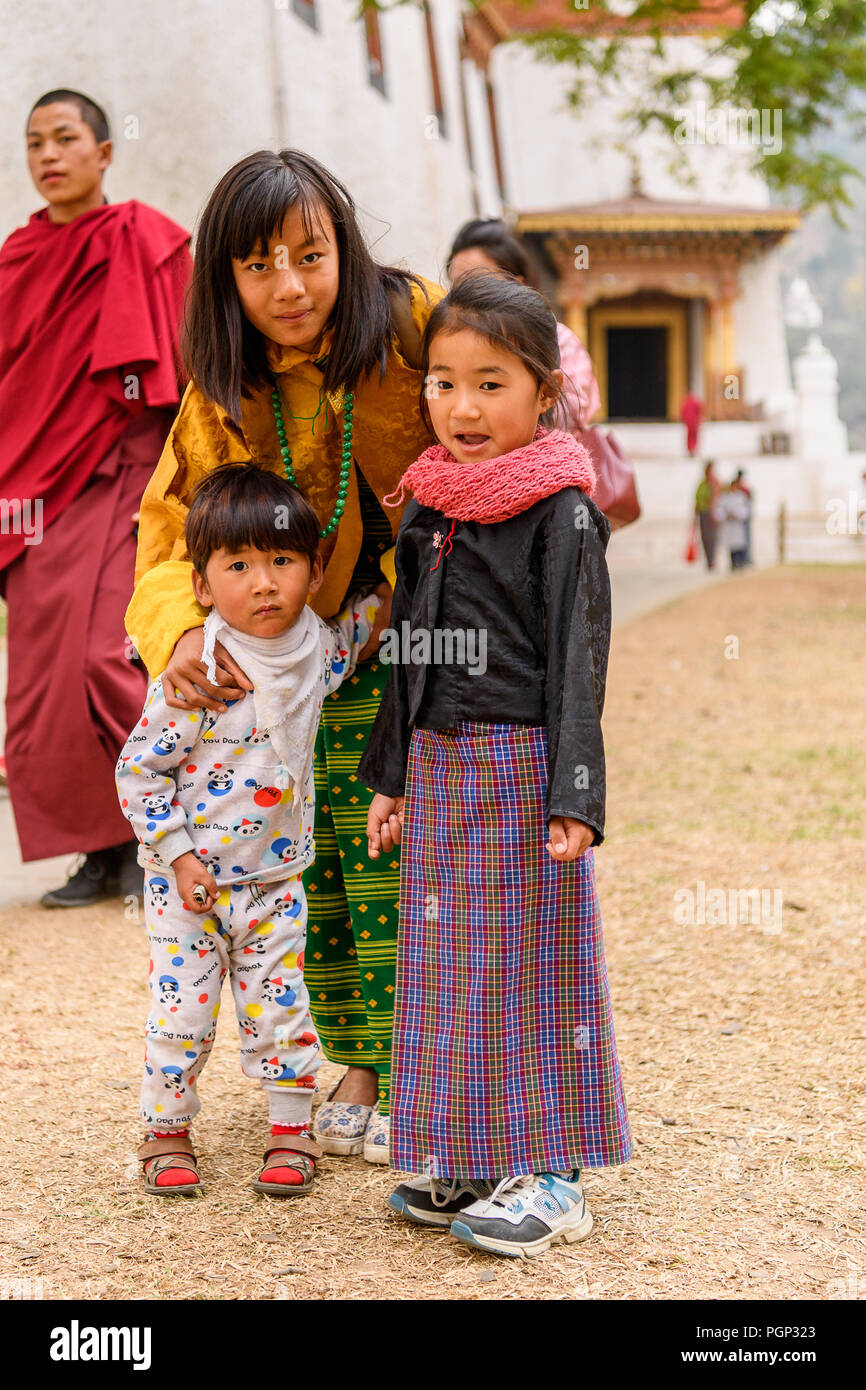 TRIMPHU, BHUTAN - MAR 8, 2017: Unidentified Ngalops woman and two ...