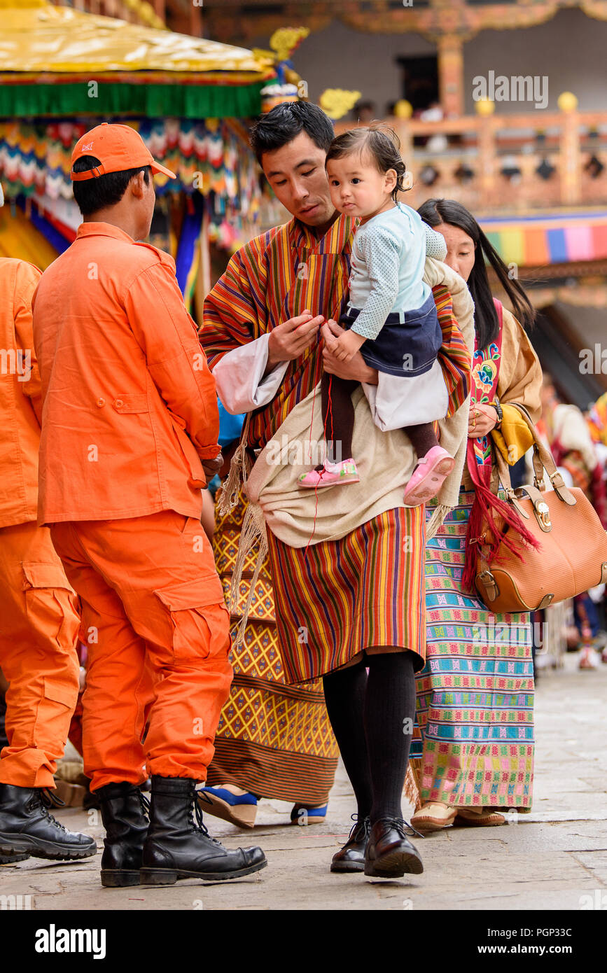 TRIMPHU, BHUTAN - MAR 8, 2017: Unidentified Ngalops people walk in the ...