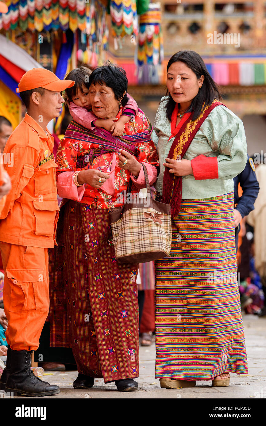 TRIMPHU, BHUTAN - MAR 8, 2017: Unidentified Ngalops people walk in the ...