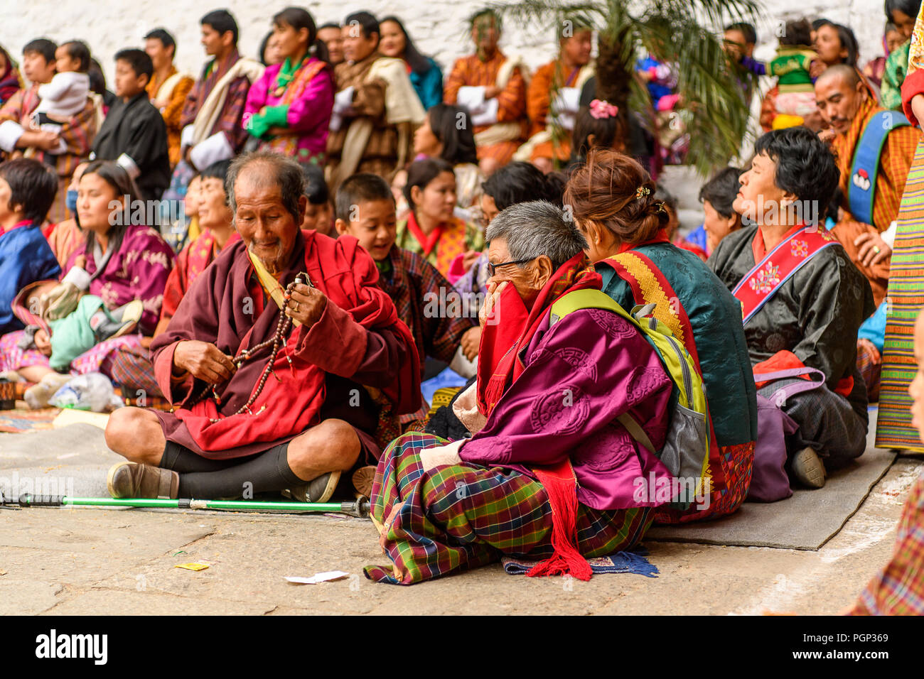 TRIMPHU, BHUTAN - MAR 8, 2017: Unidentified Ngalops people watch the ...
