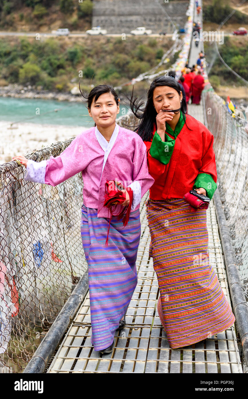 TRIMPHU, BHUTAN - MAR 8, 2017: Unidentified Ngalops girls walk on the ...