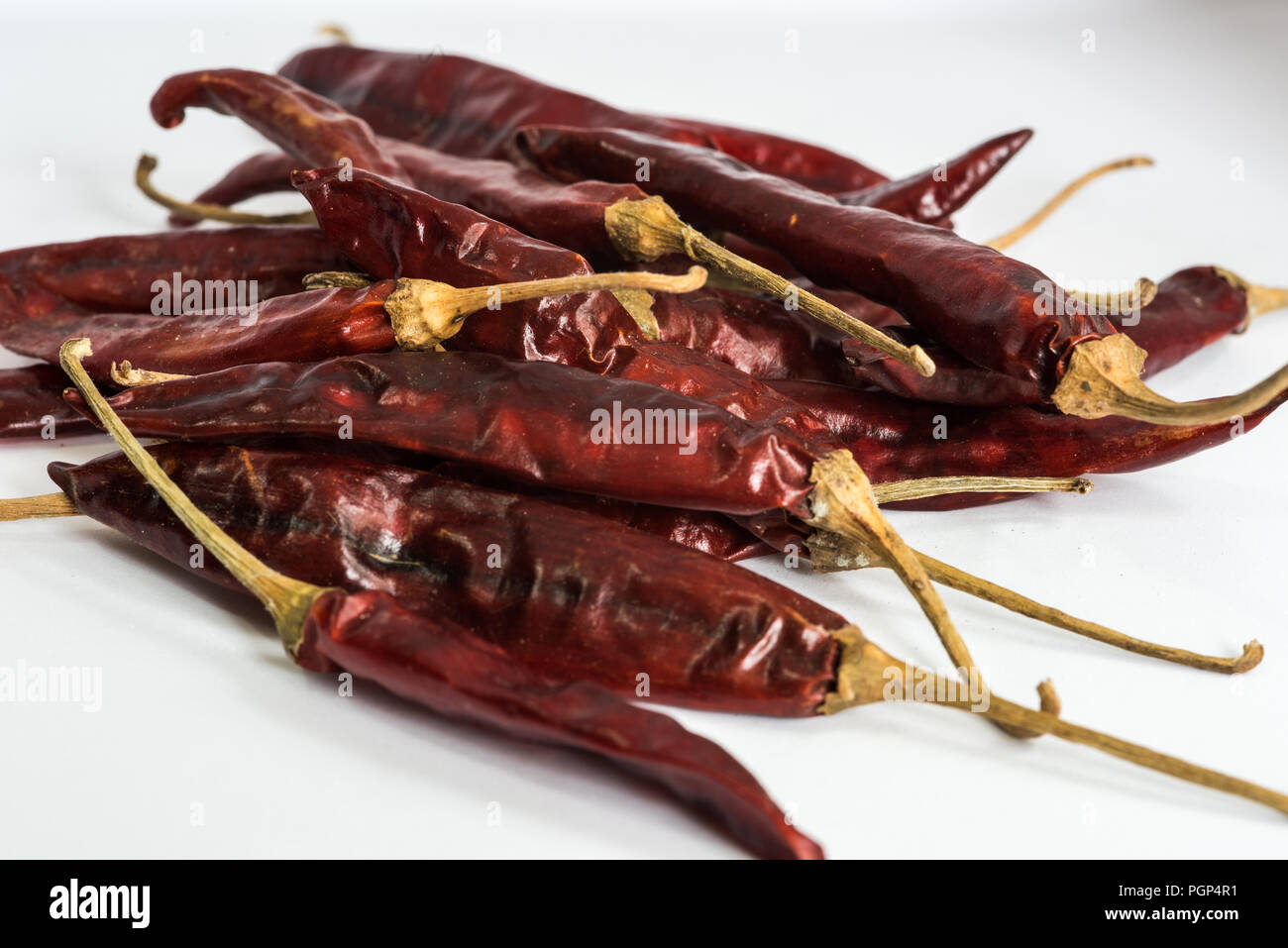 Red chilly dried spice isolated on white background Stock Photo - Alamy
