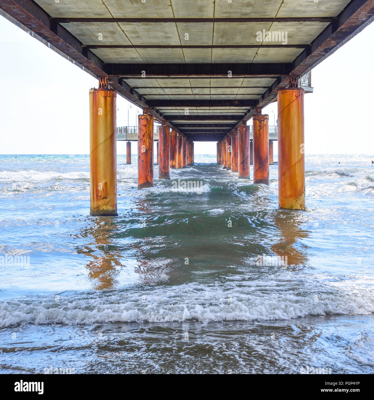sea under the pier Stock Photo - Alamy