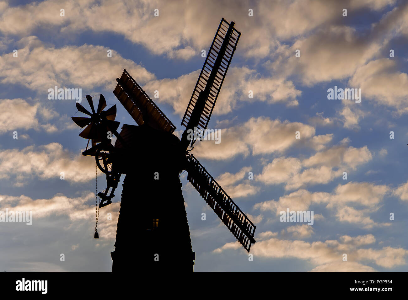 Silhouette of a traditional old windmill in countryside Englamd, UK ...