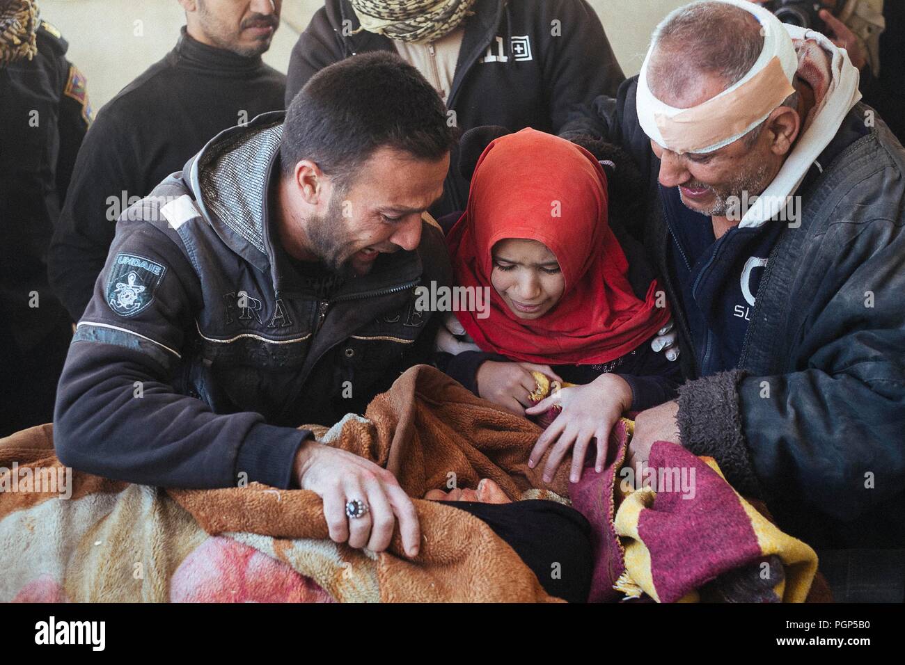Crying Family In A Hospital