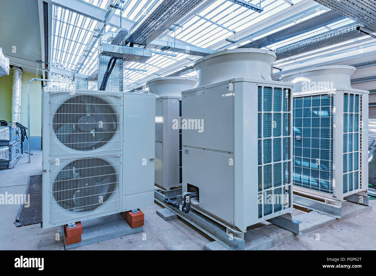 Air conditioning system assembled and installed on top of the building ...