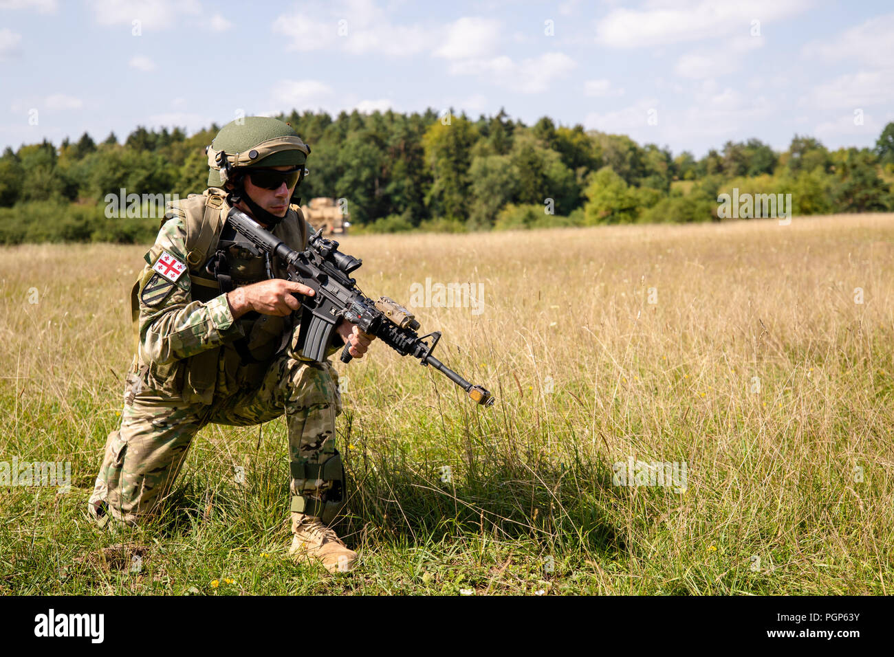 A Georgian soldier surveys the surrounding area during a medical ...