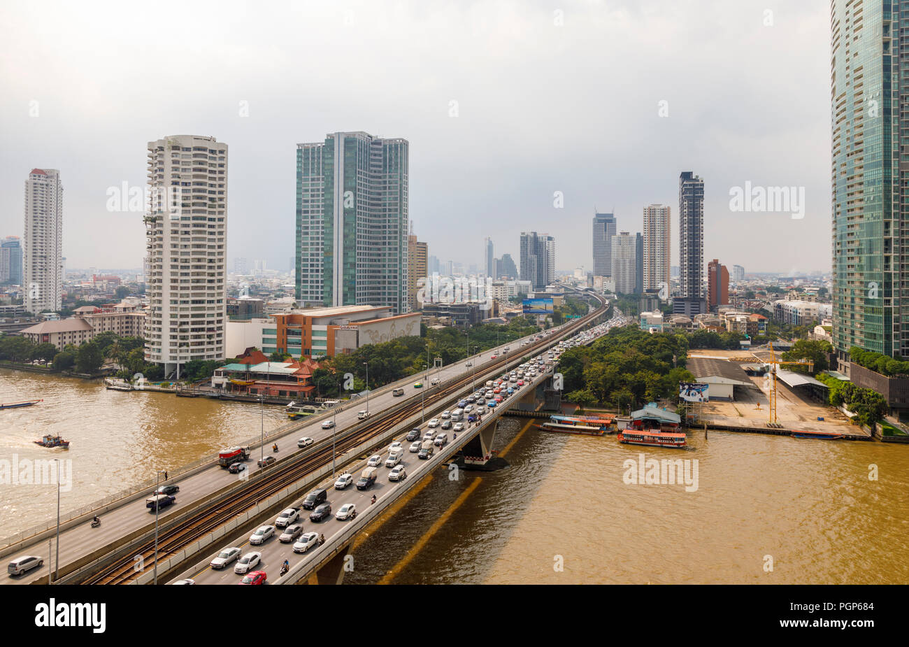 Busy Krung Thon Buri Road, King Taksin Bridge over the Chao Phraya ...
