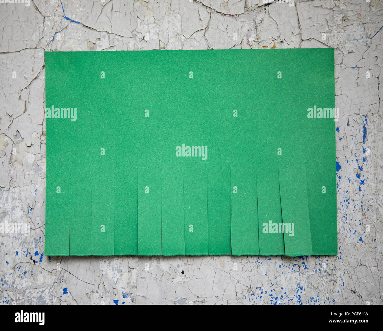 Blank green paper with tear off tabs Stock Photo - Alamy