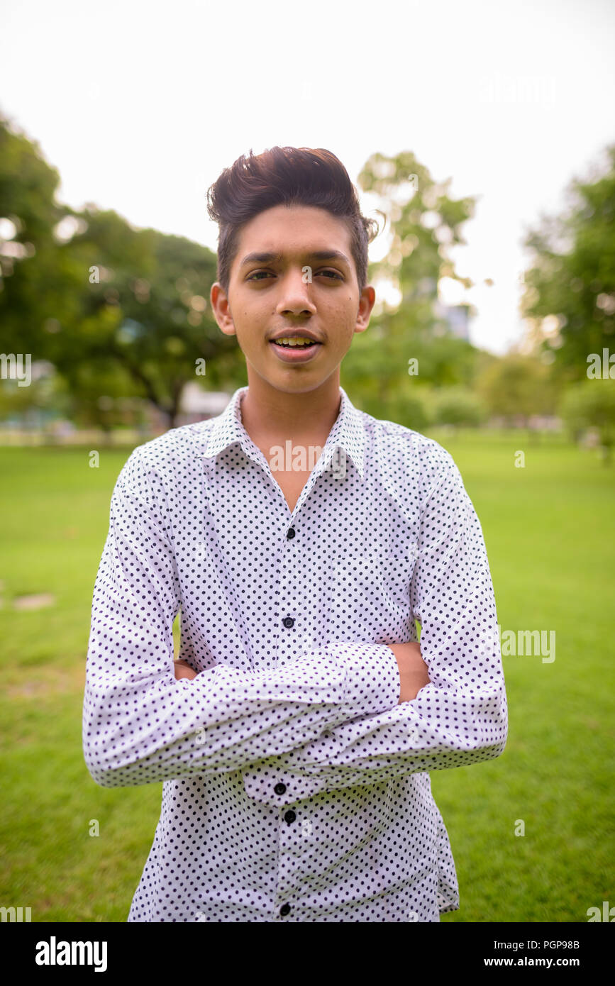Smiling indian teenager boy hi-res stock photography and images - Alamy
