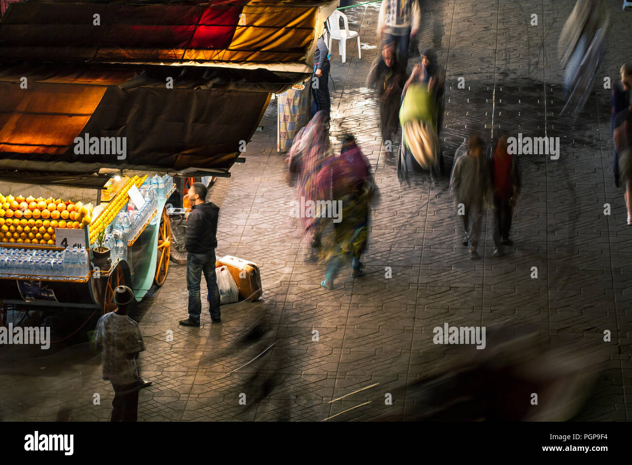 Marrakech Morocco night market Jemma el Fna. Aerial close up of people ...