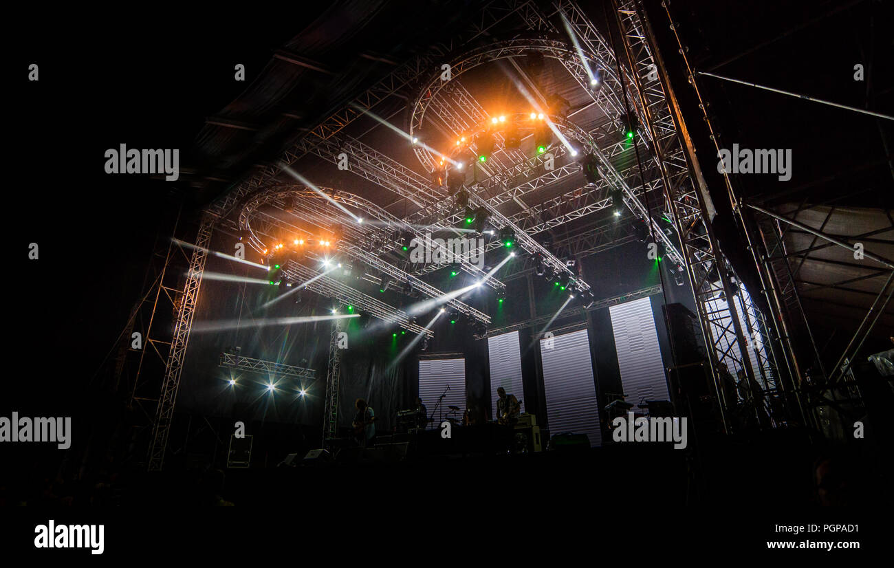 Guitarist on a stage playing rock song Stock Photo - Alamy