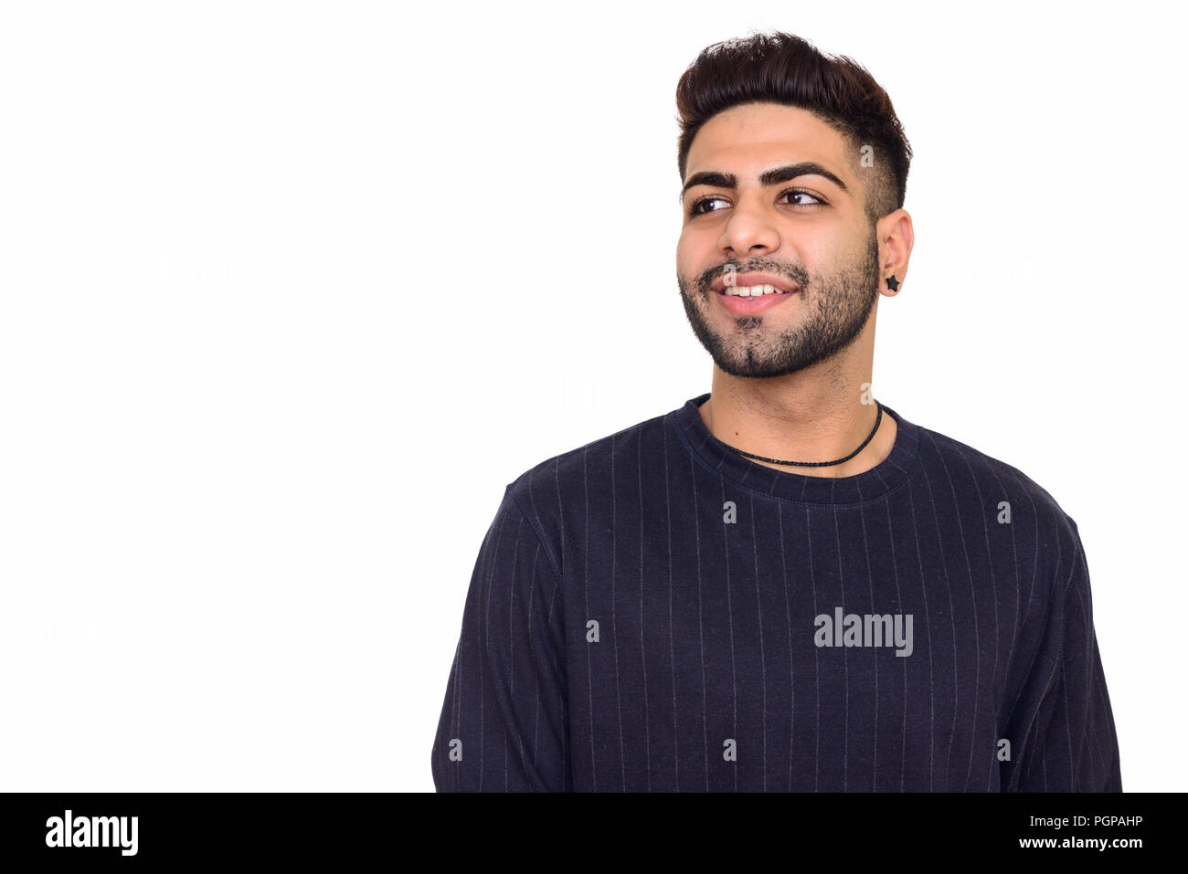 Studio shot of young happy Indian man isolated against white bac Stock ...