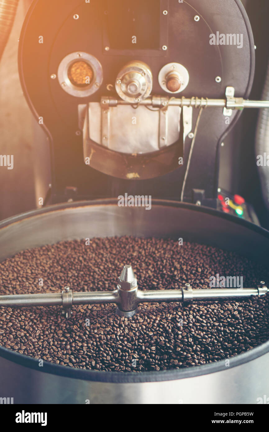 Roasted coffee in coffee roaster Stock Photo - Alamy
