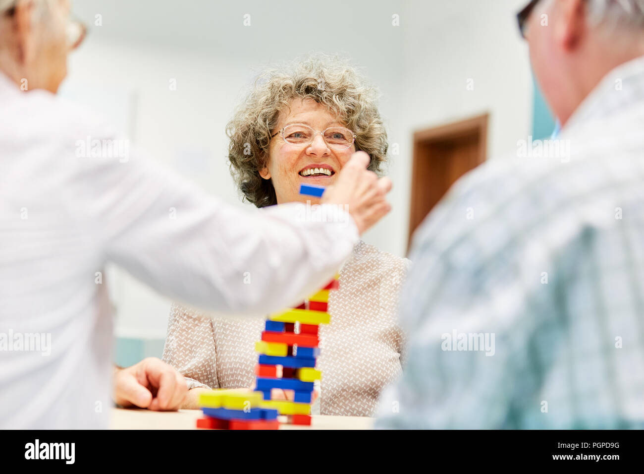 Woman building blocks hi-res stock photography and images - Alamy