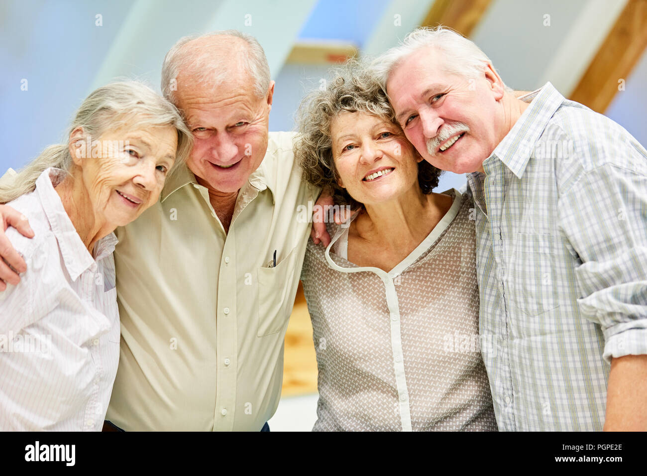 Happy retired seniors are holding together in retirement home Stock ...