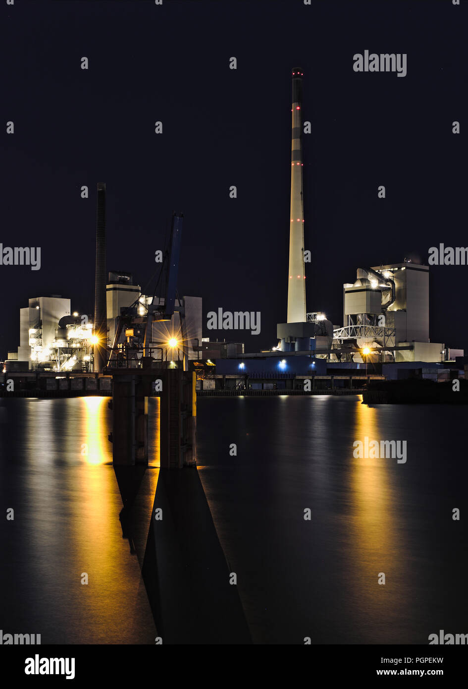 Bremen, Germany - View across the harbor at night at various brightly ...