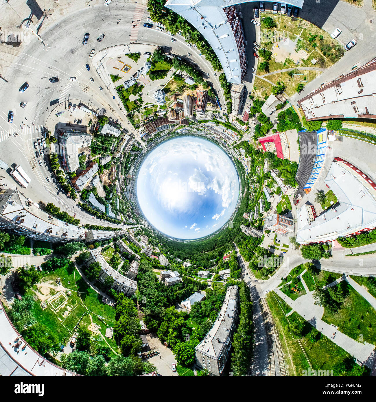 Aerial city view with crossroads and roads, houses, buildings, parks ...