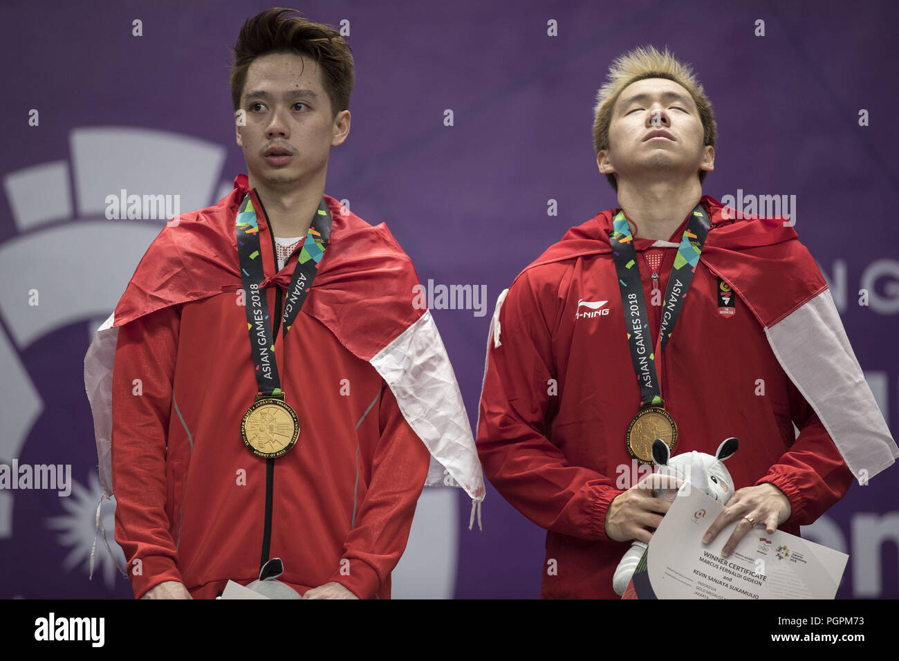 Jakarta. 28th Aug, 2018. Gold medalists Marcus Fernaldi Gideon (R ...