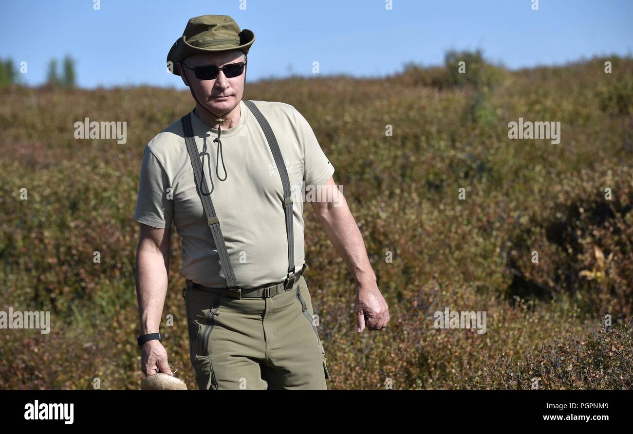 Russian President Vladimir Putin enjoys the wilderness during a hike in ...