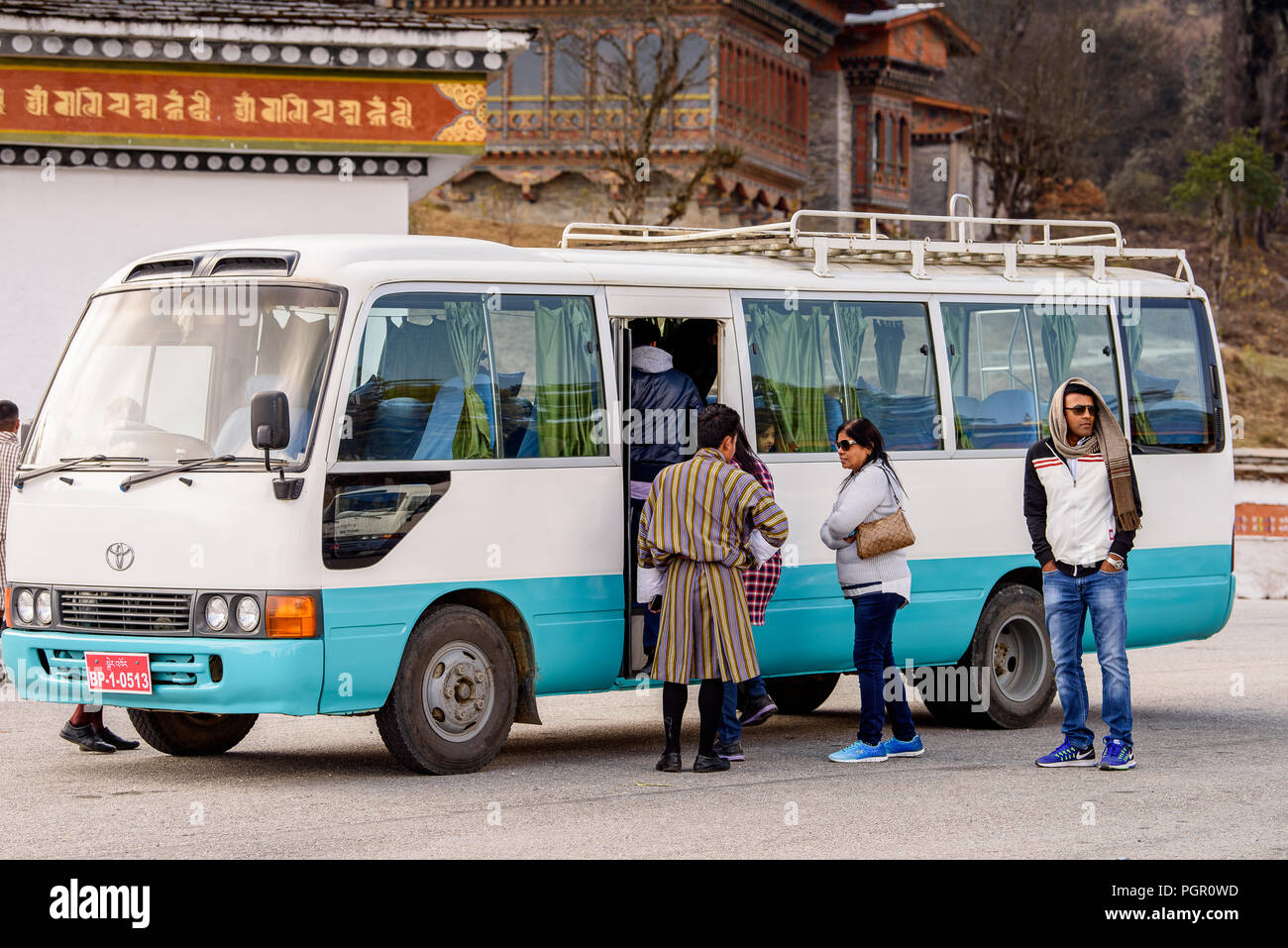 TRIMPHU, BHUTAN - MAR 8, 2017: Unidentified Ngalops people go into the ...