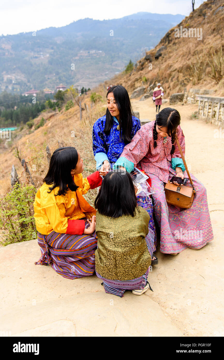 TRIMPHU, BHUTAN - MAR 8, 2017: Unidentified Ngalops girls rest from ...