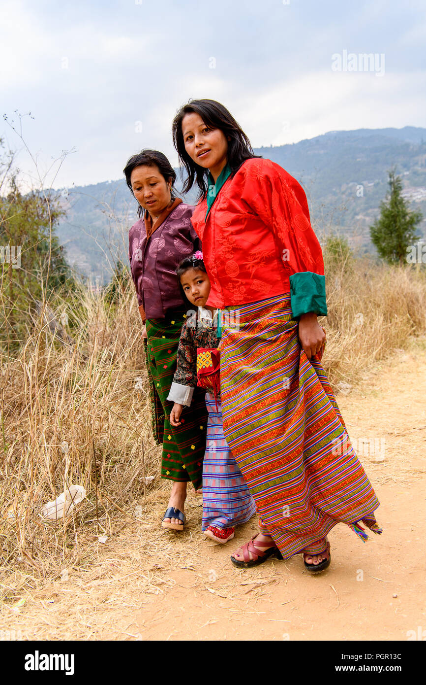 TRIMPHU, BHUTAN - MAR 8, 2017: Unidentified Ngalops people walk aong ...