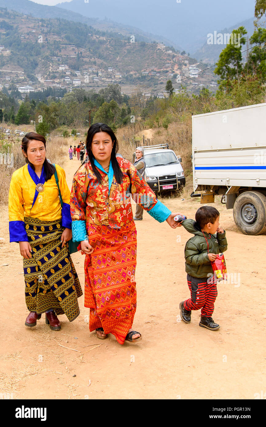 TRIMPHU, BHUTAN - MAR 8, 2017: Unidentified Ngalops people walk aong ...