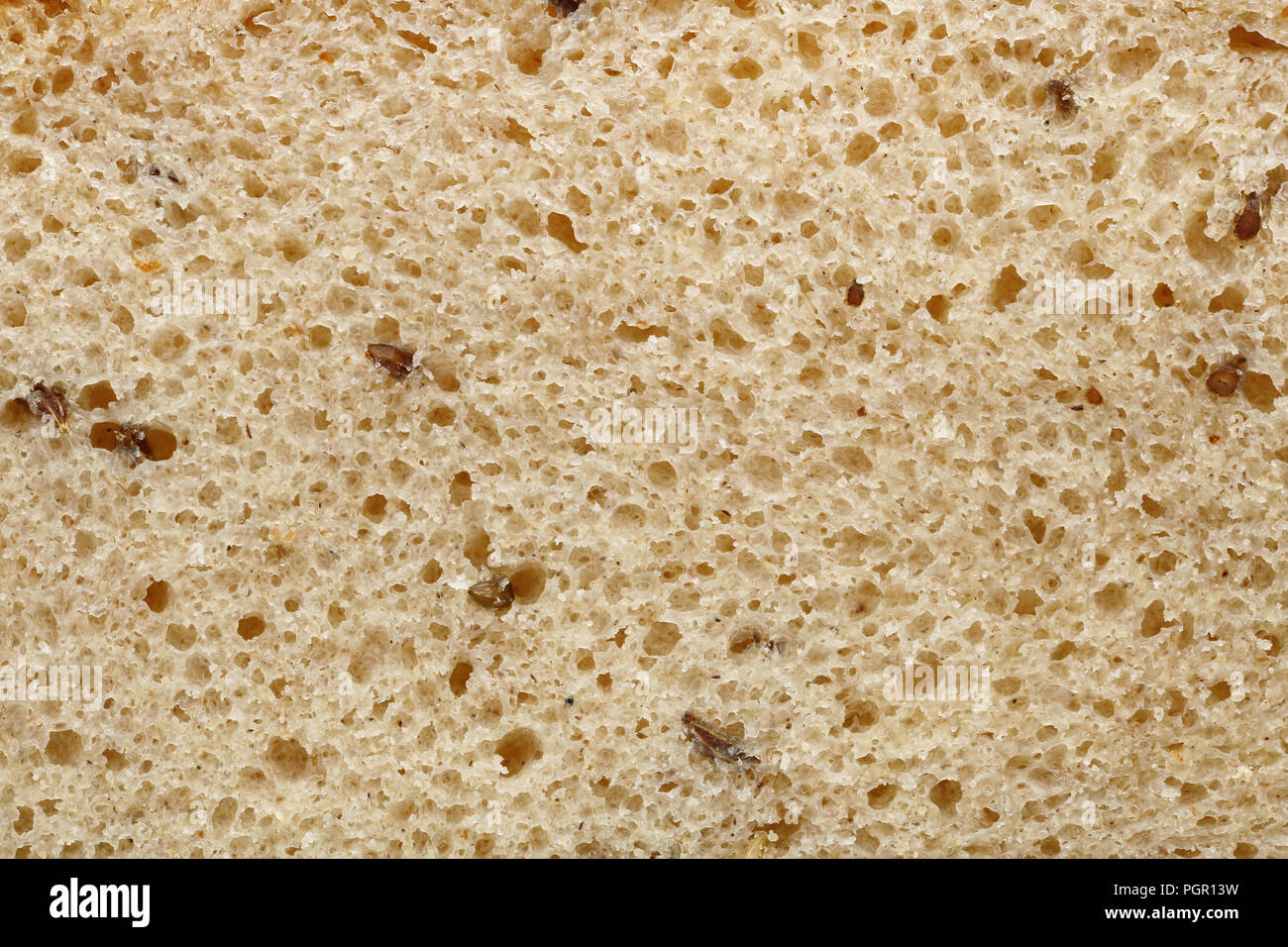 Macro texture of rustic simple gray rough rye bread with cumin seeds ...
