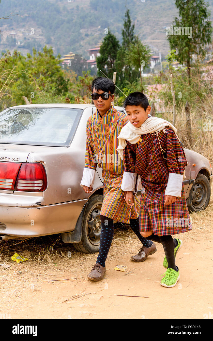 TRIMPHU, BHUTAN - MAR 8, 2017: Unidentified Ngalops people walk aong ...