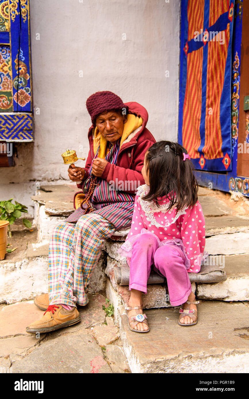 TRIMPHU, BHUTAN - MAR 8, 2017: Unidentified Ngalops old man and a ...