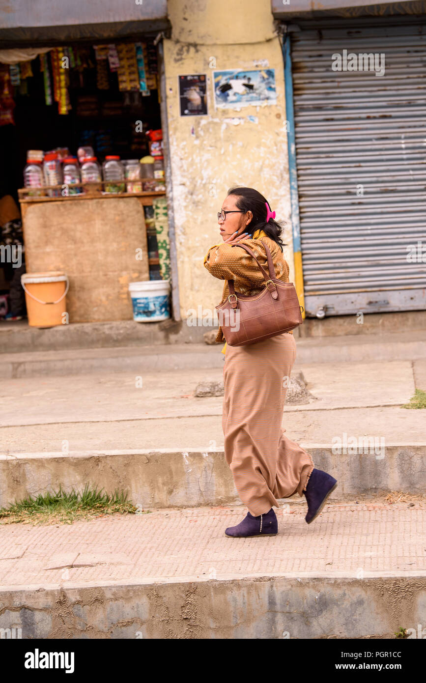 TRIMPHU, BHUTAN - MAR 8, 2017: Unidentified Ngalops woman walks along ...