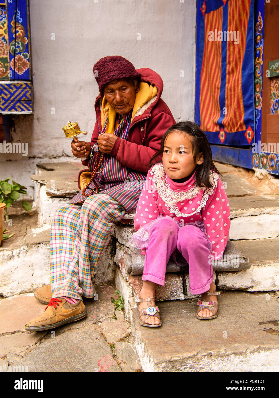 TRIMPHU, BHUTAN - MAR 8, 2017: Unidentified Ngalops old man and a ...
