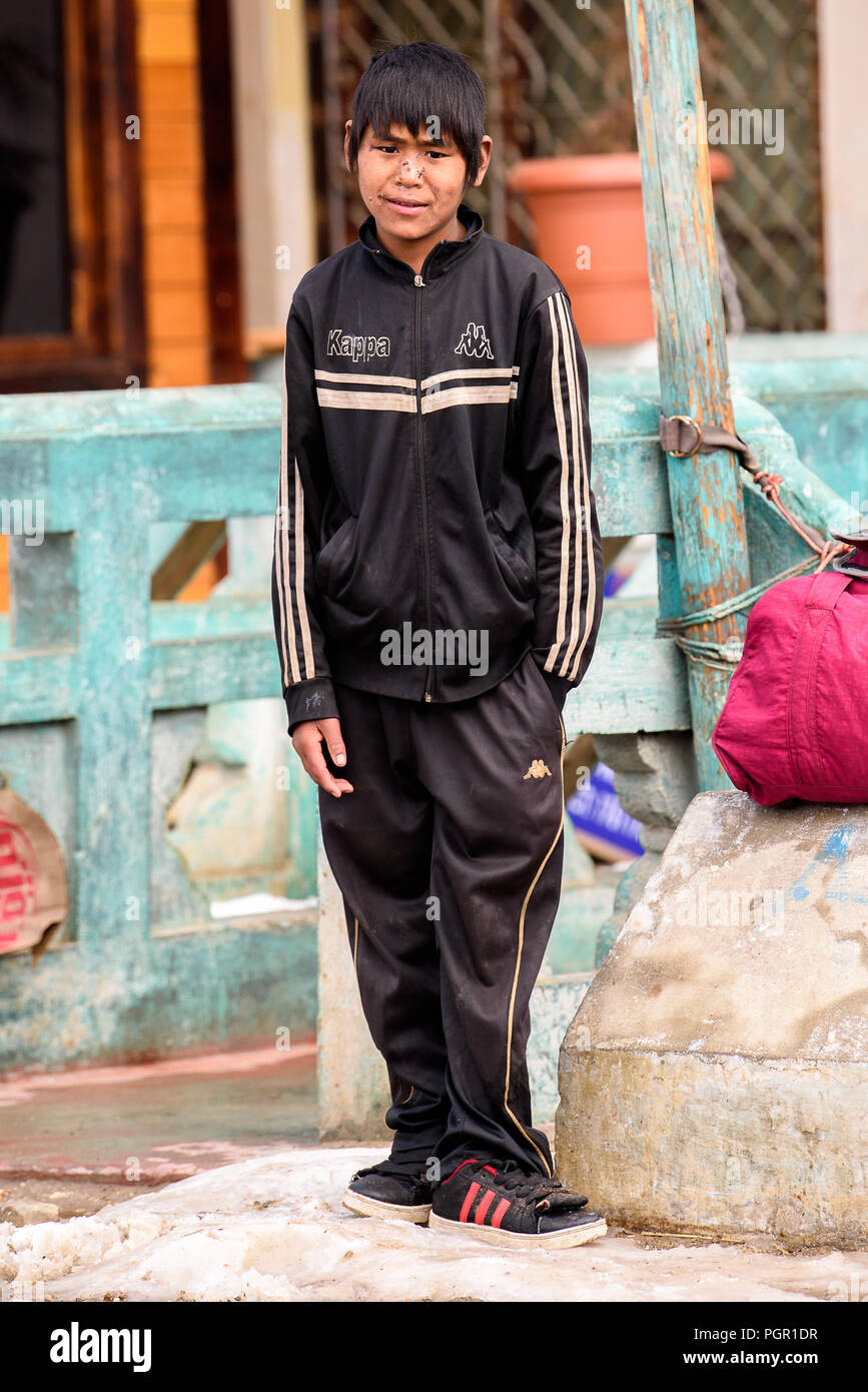 TRIMPHU, BHUTAN - MAR 8, 2017: Unidentified Ngalops boy in sport suit ...