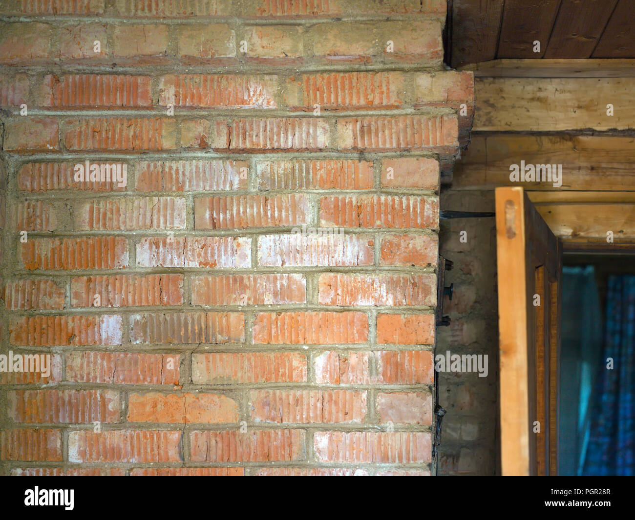 Old house interior with brick and wooden walls Stock Photo - Alamy