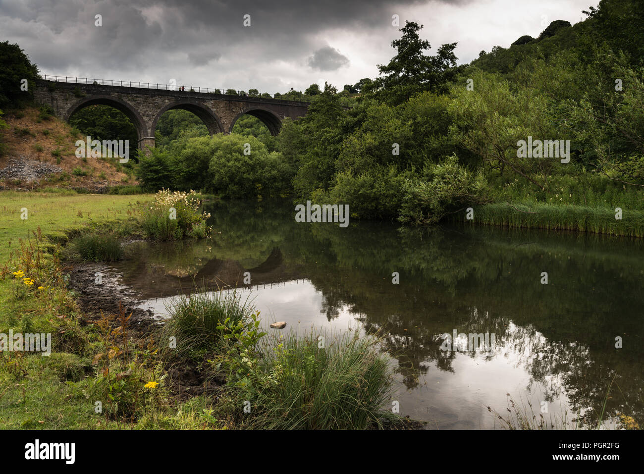 The peaceful valley of Monsal Dale in the English Peak District ...