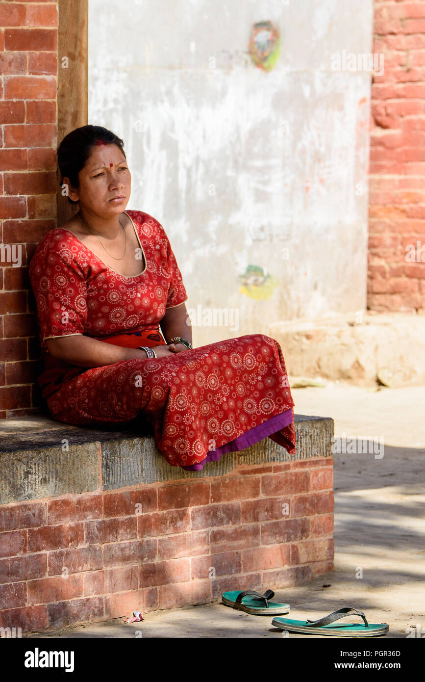 KATMANDU, NEPAL - MAR 6, 2017: Unidentified Chhetri woman in red dress ...