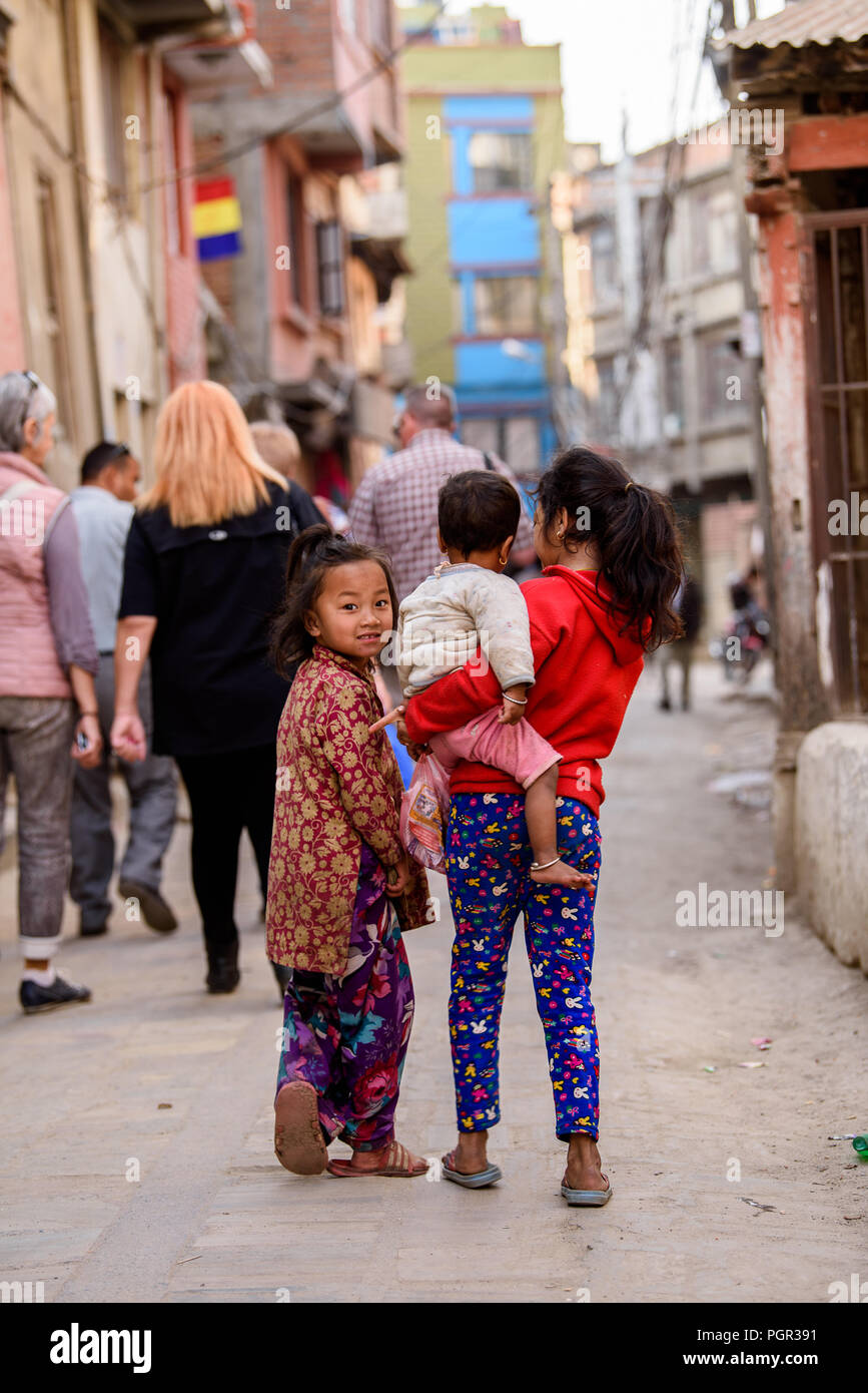 KATMANDU, NEPAL - MAR 6, 2017: Unidentified Chhetri girl in red jamper ...